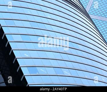 office building turquoise blue glass wall reflection detail Stock Photo ...