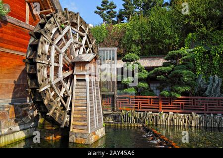 Wooden waterwheel in a pond in rural China Stock Photo - Alamy
