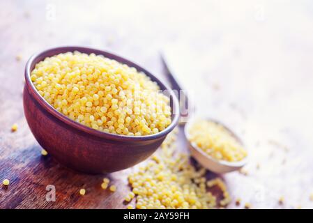 Dry ptitim heap in the bowl for cooking Stock Photo - Alamy