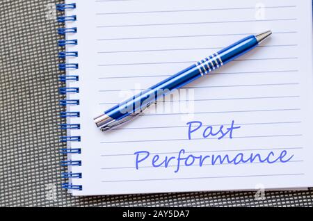 Past performance write on notebook Stock Photo - Alamy