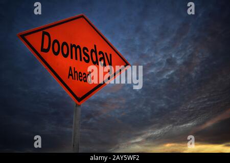 Doomsday Ahead warning road sign with storm background Stock Photo - Alamy