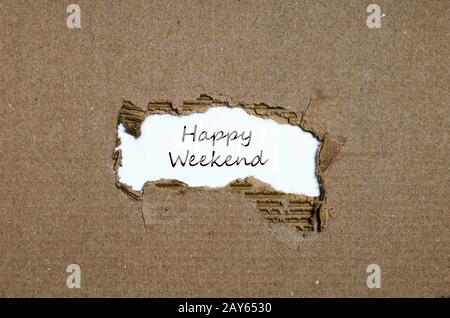 The words happy weekend appearing behind torn paper Stock Photo - Alamy
