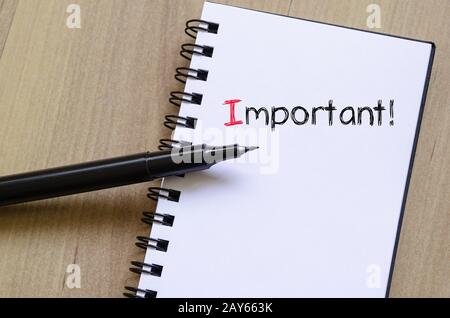 Important text concept on notebook Stock Photo - Alamy