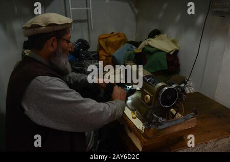 February 8, 2020: Peshawar, Pakistan. A traditional workshop producing ...