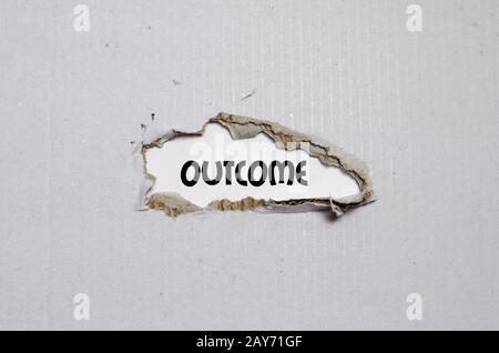 The word outcome appearing behind torn paper Stock Photo - Alamy