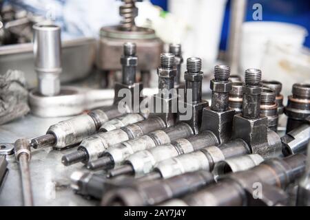 Used fuel injector. Rusty diesel engine nozzle part isolated on white ...