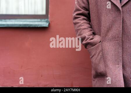 Back view faceless portrait of red-haired girl with fall leaves in hair ...