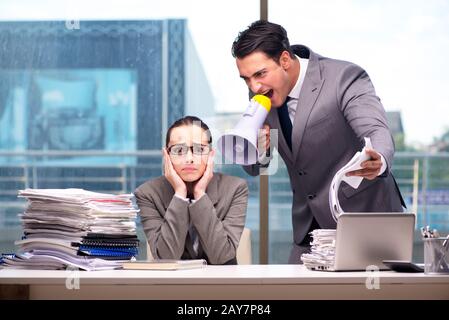 The boss yelling at his team member Stock Photo - Alamy