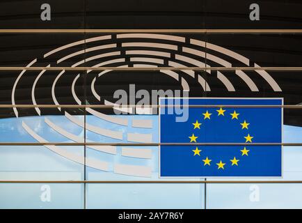 A euro symbol and the logo of the European Parliament outside the ...