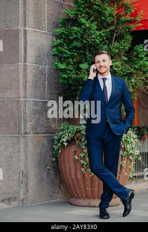 Photo of intelligent clever handsome man wear orange shirt green ...