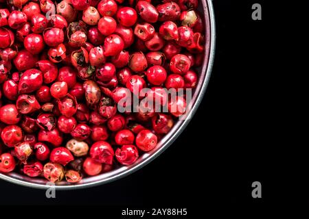 Red pepper seeds in pot with copy space. Detail macro Stock Photo - Alamy