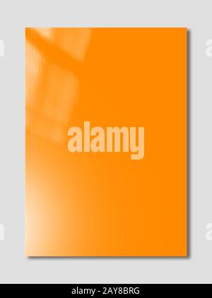 Orange booklet cover isolated on white background, mockup template ...