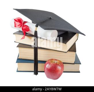 Grad hat with books isolated on white Stock Photo - Alamy