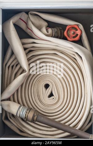 fire brigade, hose, rolled, unrolled, fire brigade, hose, rolled ...