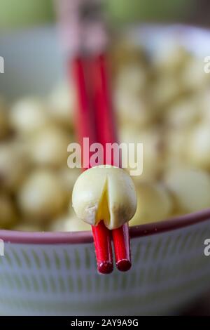 Asian cuisine: Boiled lotus seeds Stock Photo - Alamy