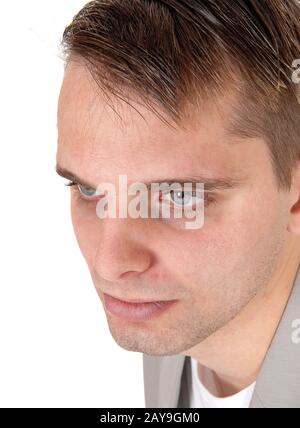 Handsome guy posing - looking down and slicing Stock Photo - Alamy