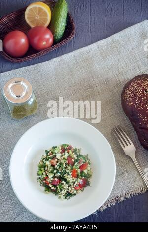 Salad Tabule - a common dish of Arabic cuisine Stock Photo - Alamy