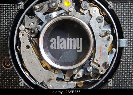 Shutter mechanism of a photographic camera. Close-up. Isolated on a ...