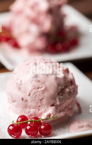 Close up of currant ice cream on plates Stock Photo - Alamy