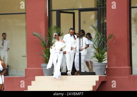 PORT OF SPAIN, TRINIDAD - FEB 14: Renee Butcher is escorted by her ...