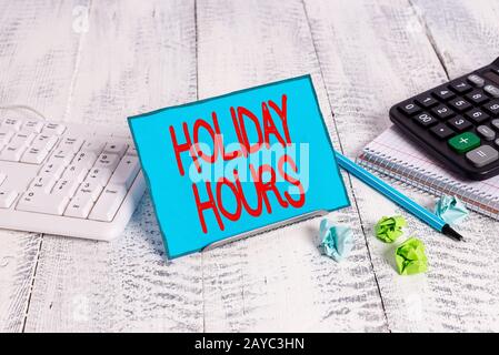 Text sign showing Holiday Hours. Word Written on Schedule 24 or7 Half ...