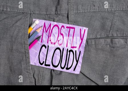 Conceptual hand writing showing Mostly Cloudy. Business photo text ...