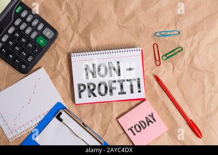 Writing note showing Non Profit. Business concept for type of ...