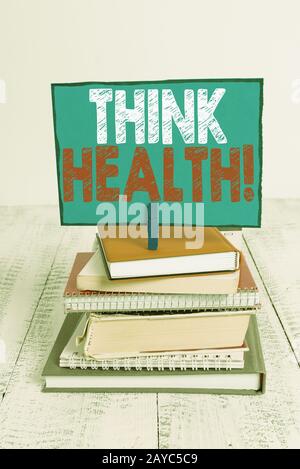 Writing note showing Think Health. Business concept for state of ...