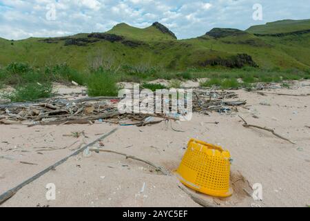 Plastic has been washed up onto the beach of Gili Banta (Banta Island ...