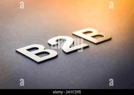 Word B2B written with white solid letters on a board. Word B2B written ...