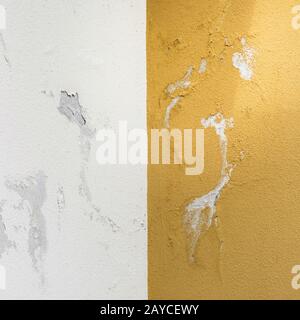 Paint peeling off plaster wall in a derelict building Stock Photo - Alamy