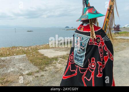 A Tlingit tribe elder wearing a traditional blanket in the village of ...