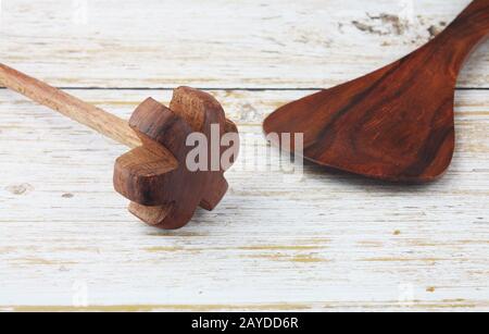 Indian made Kitchen wooden spatula and butter churner Stock Photo - Alamy