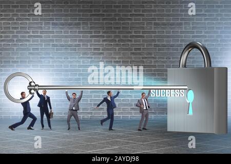 The businessmen achieving success through teamwork Stock Photo - Alamy