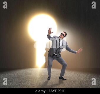 Businessman facing difficult choice dilemma Stock Photo - Alamy