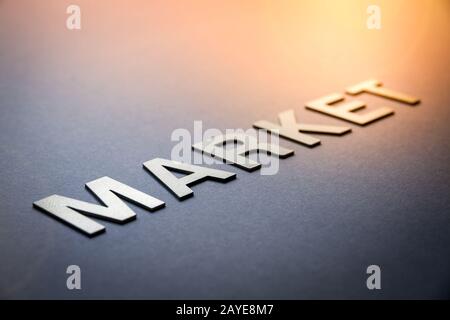 Word market written with white solid letters on a board. Word market ...