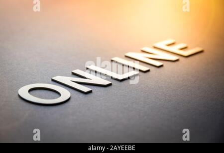 Word online written with white solid letters on a board Stock Photo - Alamy