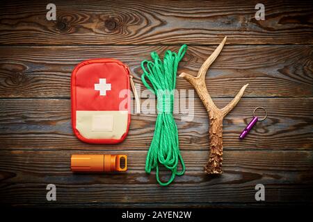Travel items for hiking over wooden background Stock Photo - Alamy
