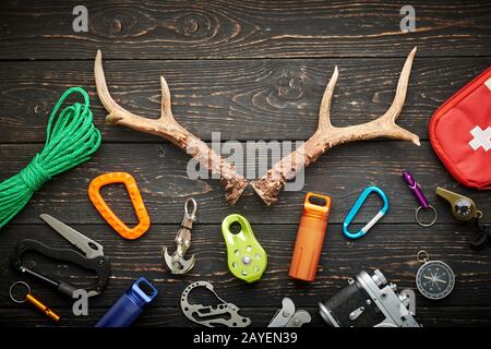 Travel items for hiking over wooden background Stock Photo - Alamy