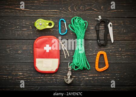 Travel items for hiking over wooden background Stock Photo - Alamy
