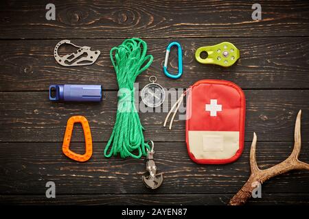Travel items for hiking over wooden background Stock Photo - Alamy