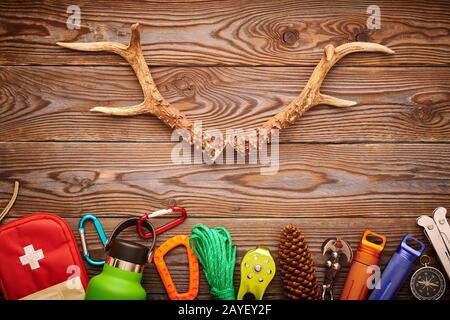 Travel items for hiking over wooden background Stock Photo - Alamy