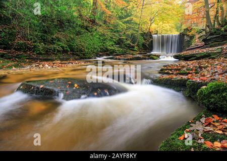 Nant Mill Waterfall near Wrexham captured in the autumn Stock Photo - Alamy