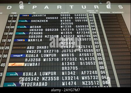 Departures flight information board: Singapore Changi Airport Stock ...
