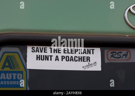 Anti poaching bumper sticker on a safari vehicle in the Masai Mara ...