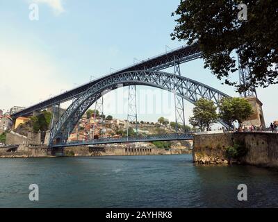 An iron bridge designed by the famous Gustave Eiffel spans the Cuyuní ...