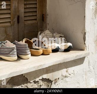 Old shoes drying outside of a house in a small Chinese village Stock ...