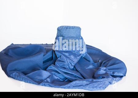 Blue burqa on white background, traditional women's clothing from ...