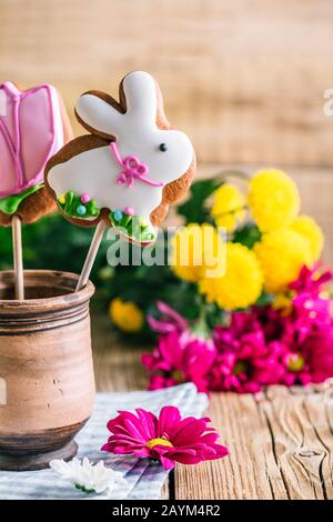 Easter gingerbread bunny cookie on vintage baking rack on dark wood ...