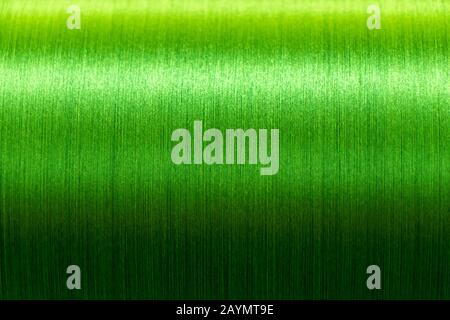 Closed up of green color of thread textured background (Focus at center ...